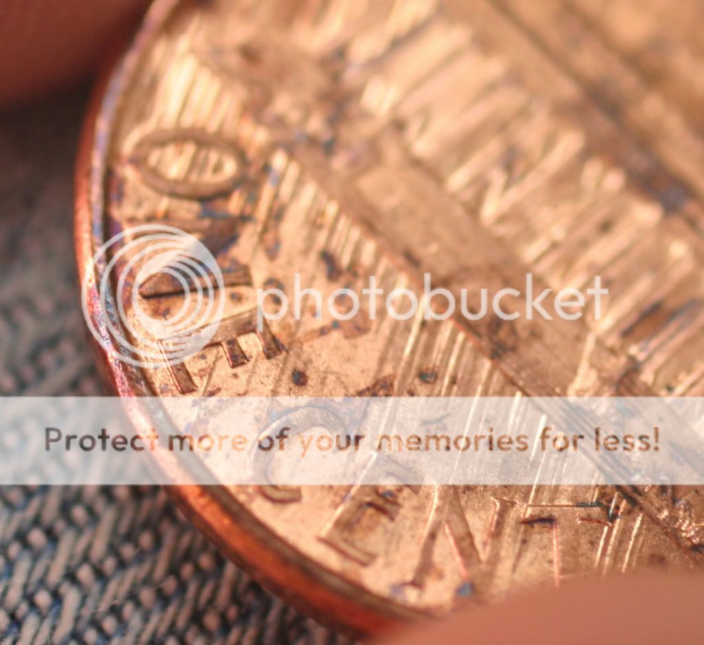 Crazy feeder finger error coin any value? | Coin Talk